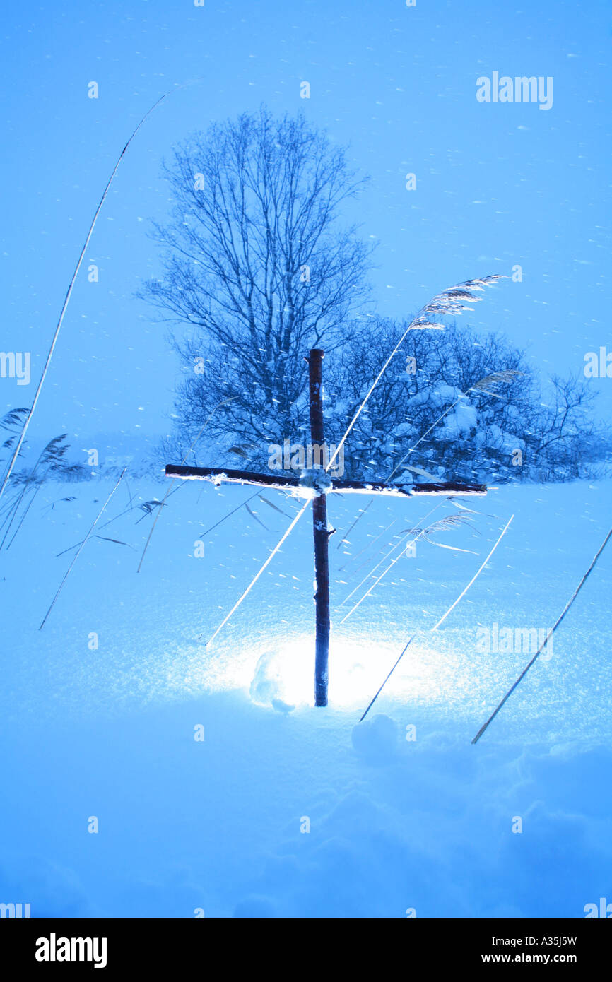 Cross in winterscene Stock Photo - Alamy