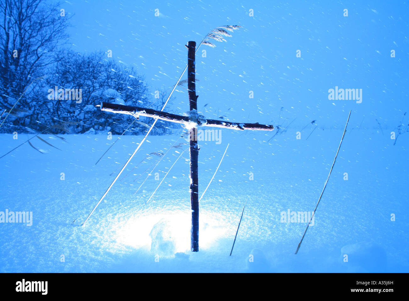 Cross in winterscene Stock Photo - Alamy