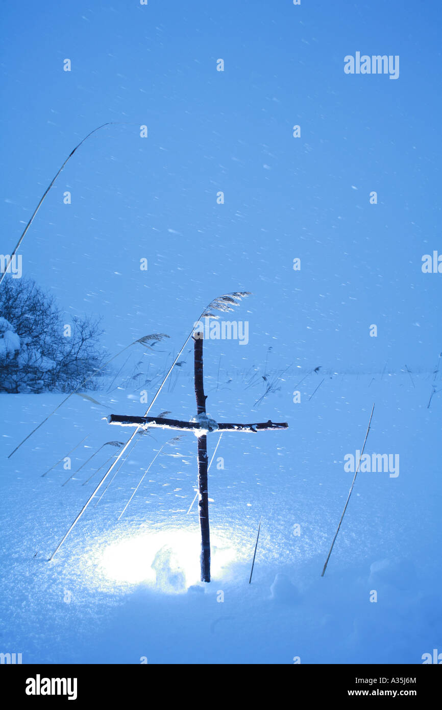 Cross in winterscene Stock Photo - Alamy