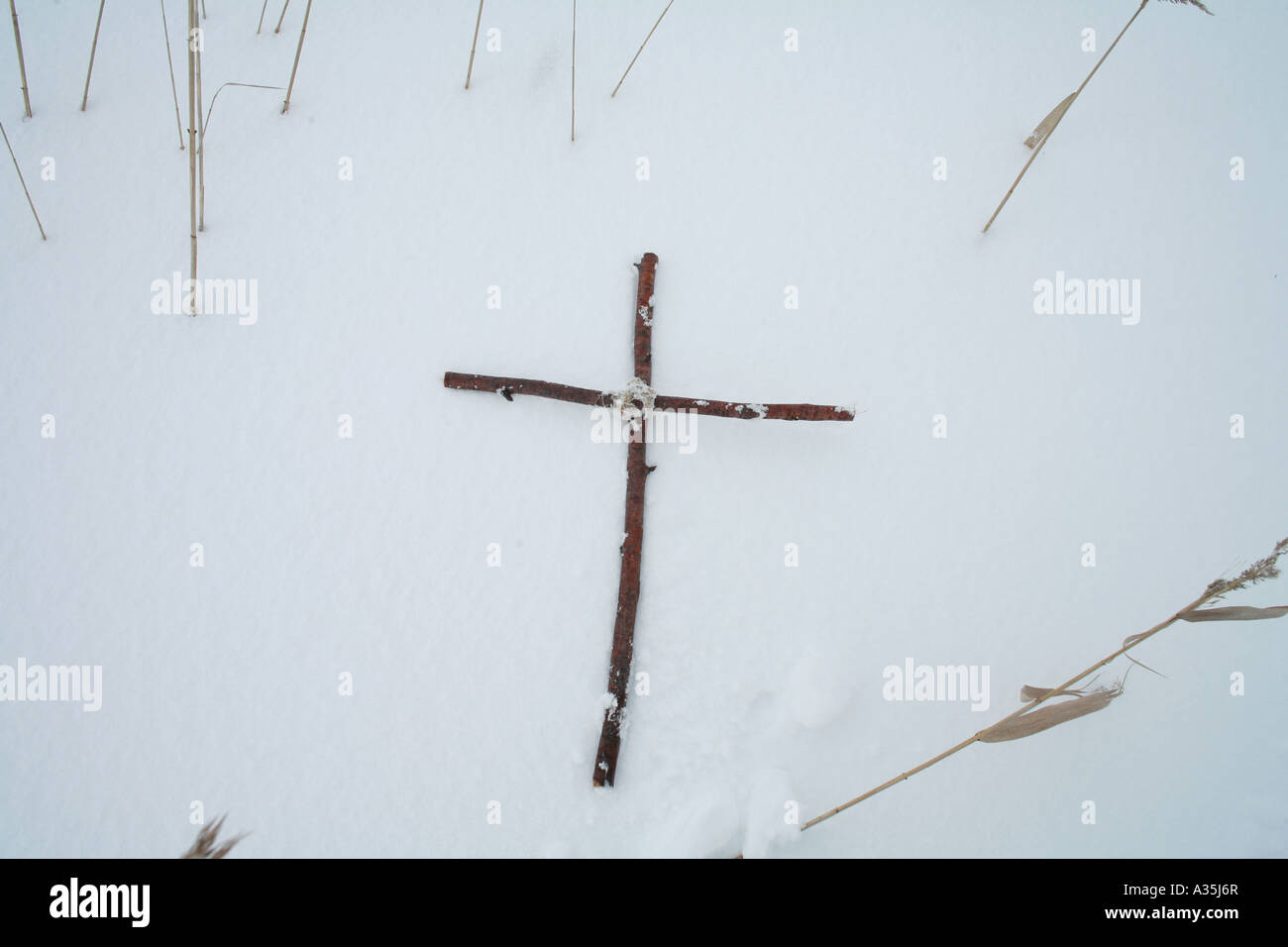 Cross in winterscene Stock Photo - Alamy
