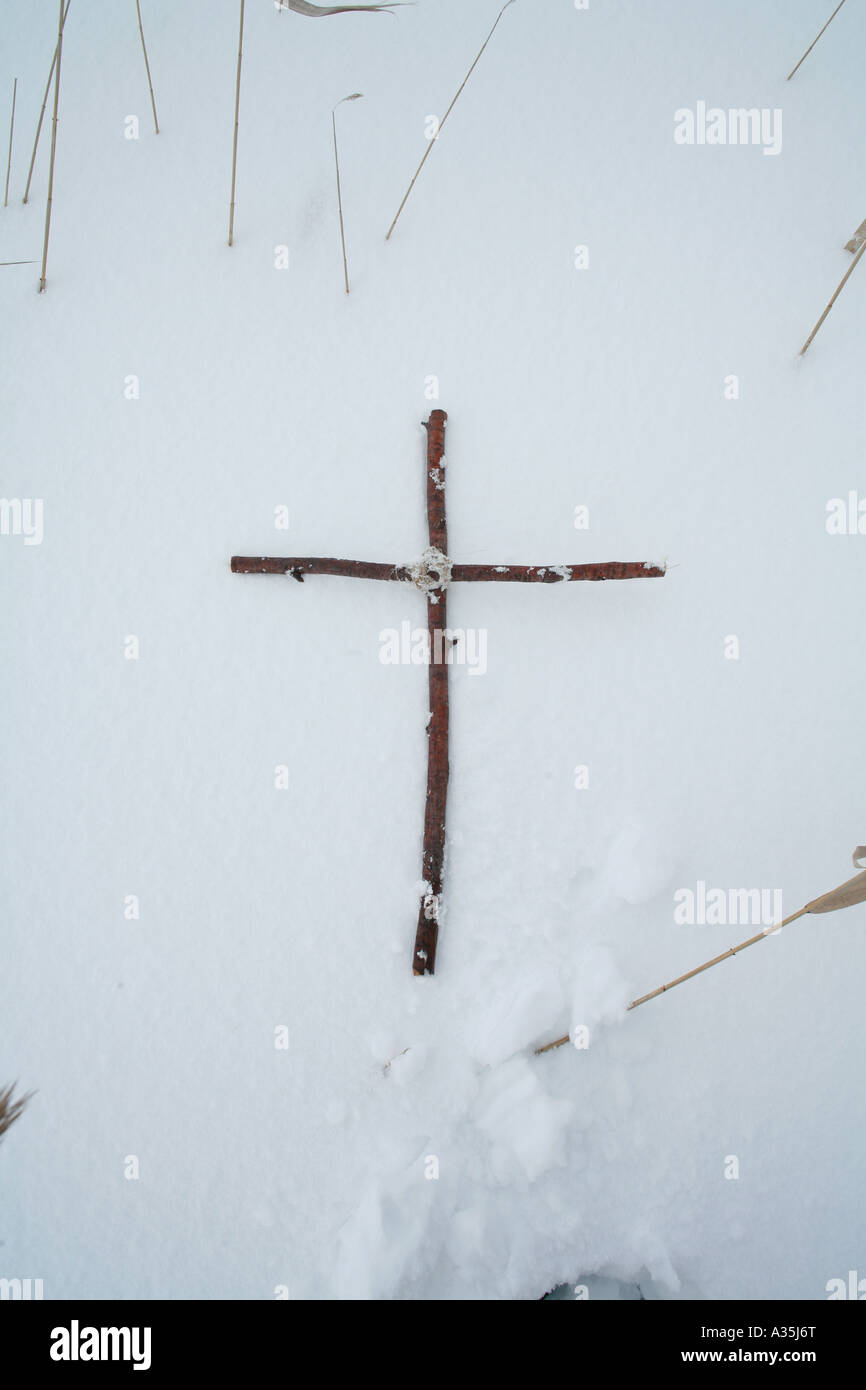 Cross in winterscene Stock Photo - Alamy