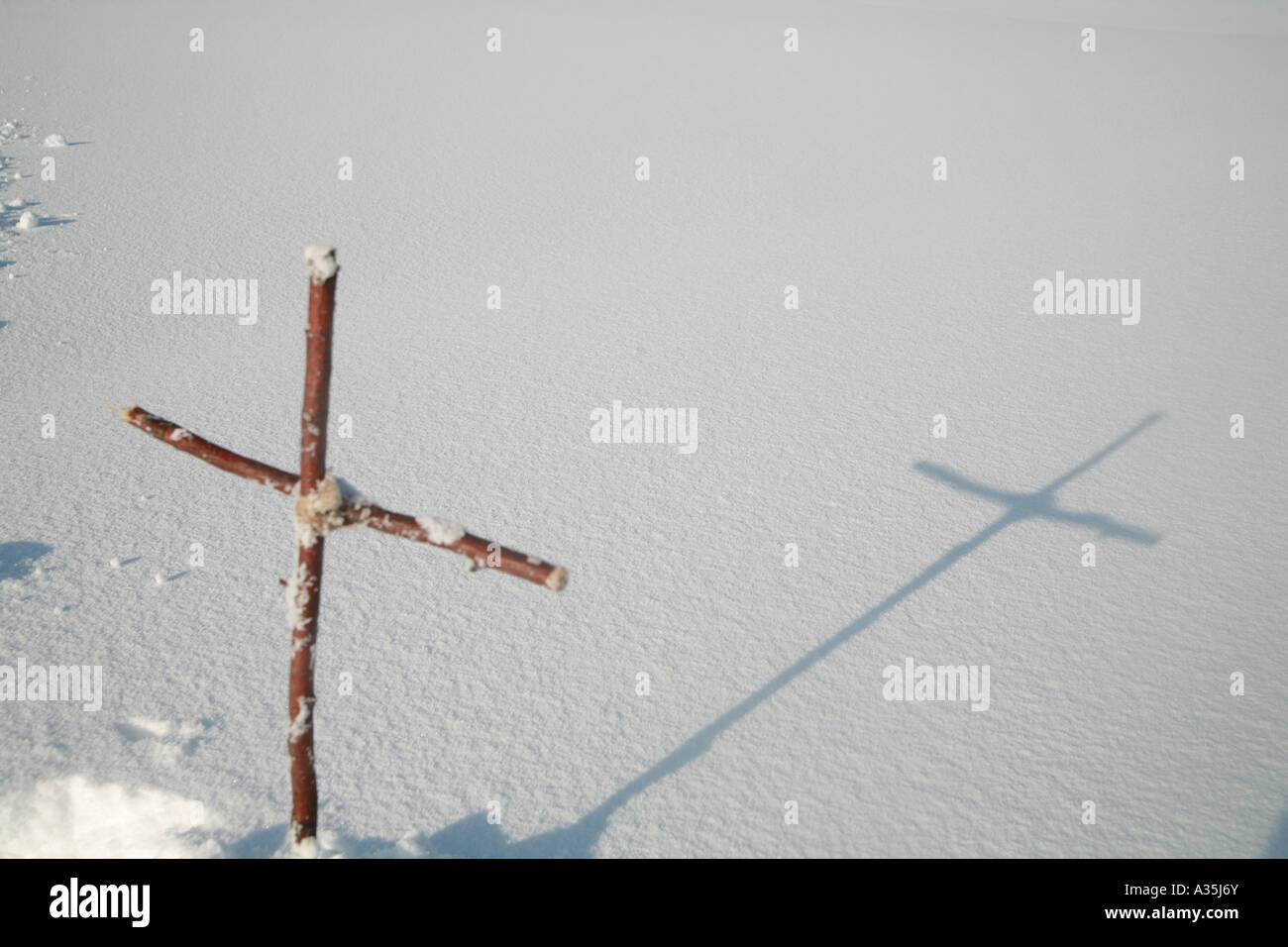 Cross in winterscene Stock Photo - Alamy