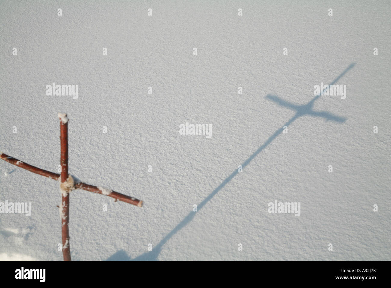 Cross in winterscene Stock Photo - Alamy