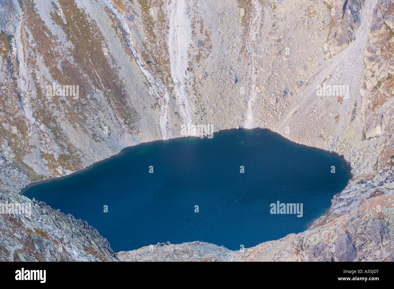 The Krivan Tarn (mountain lake) , as seen from the top of the mount ...