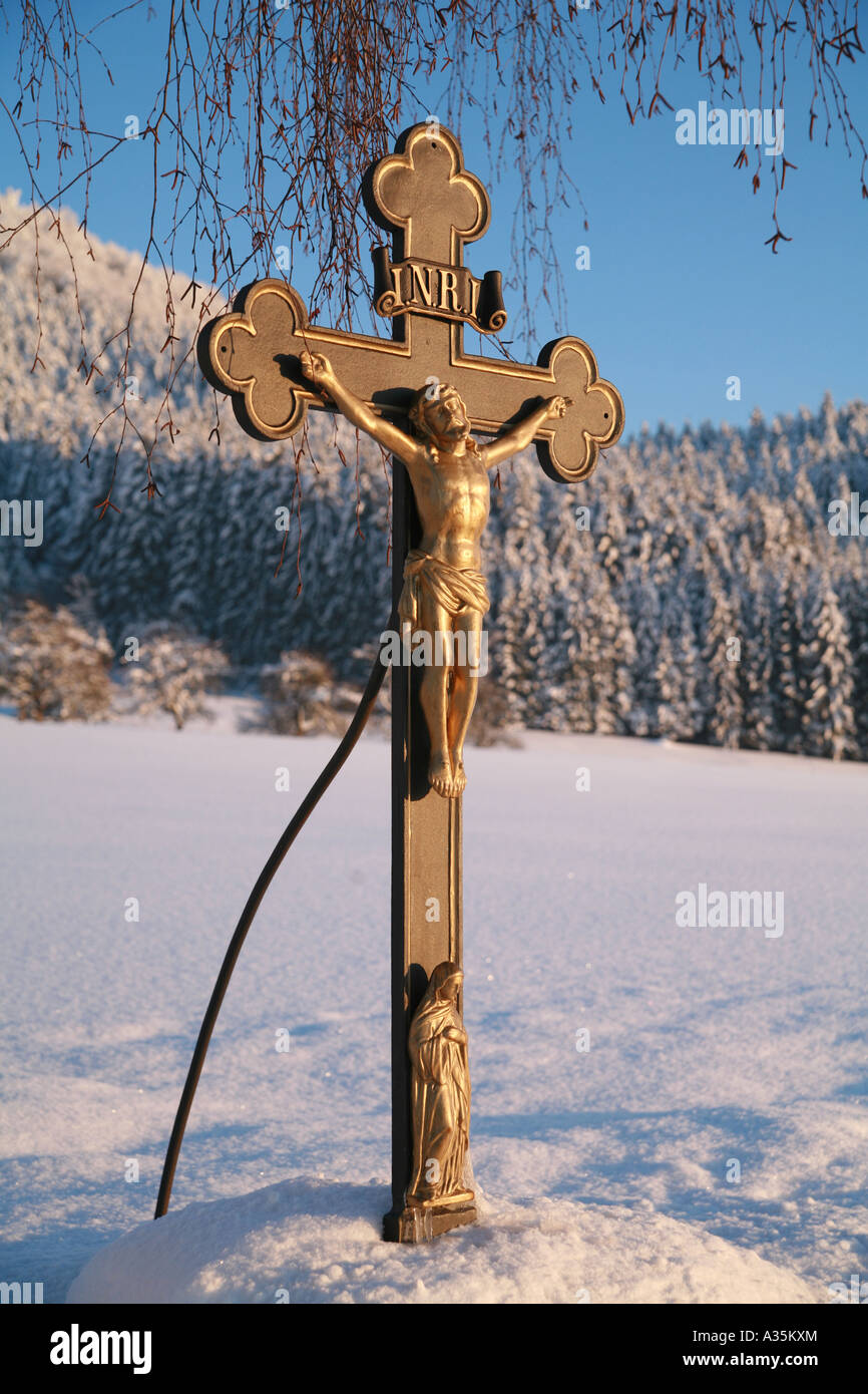 Cross in winterscene Stock Photo - Alamy