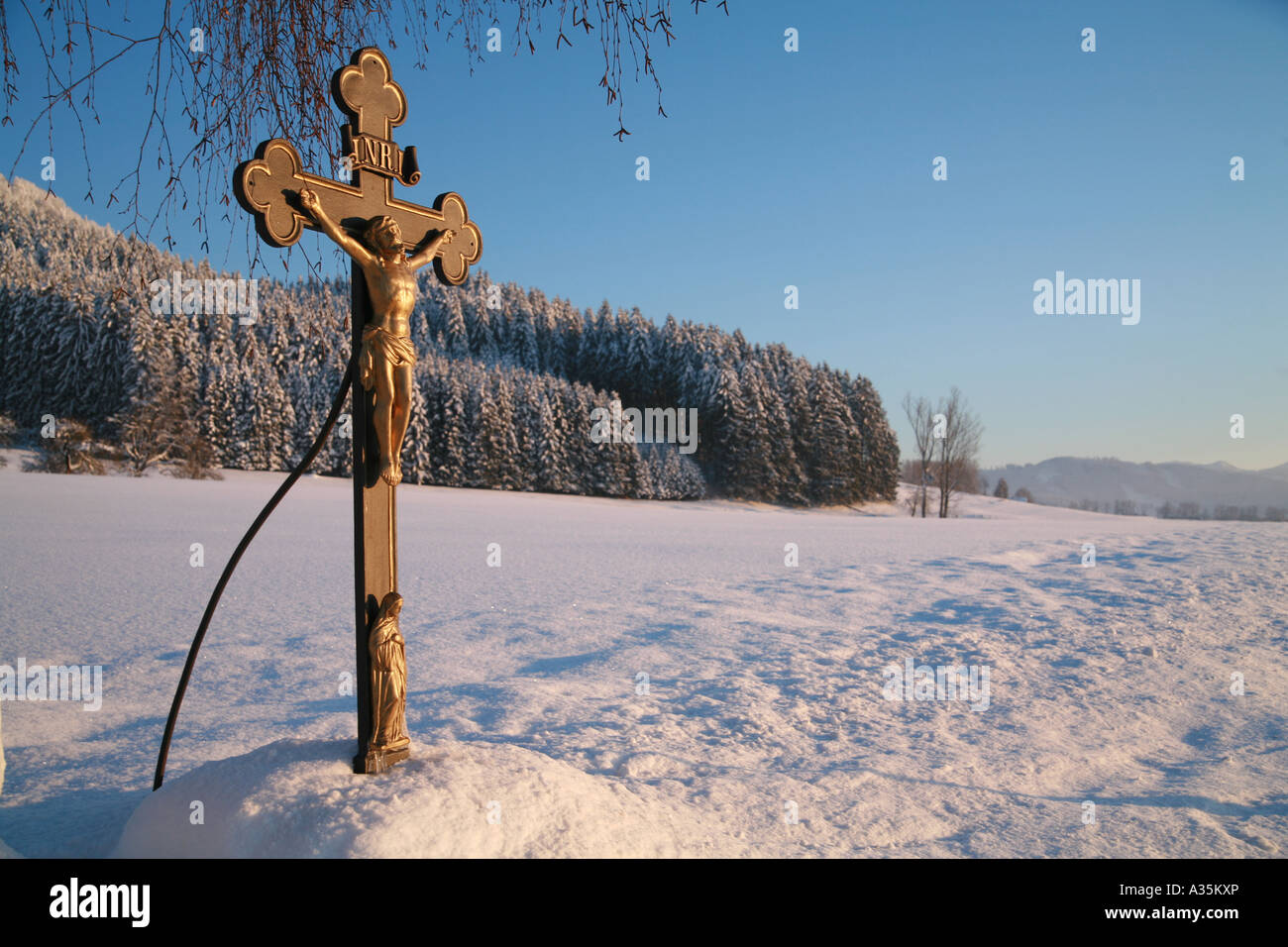 Cross in winterscene Stock Photo - Alamy
