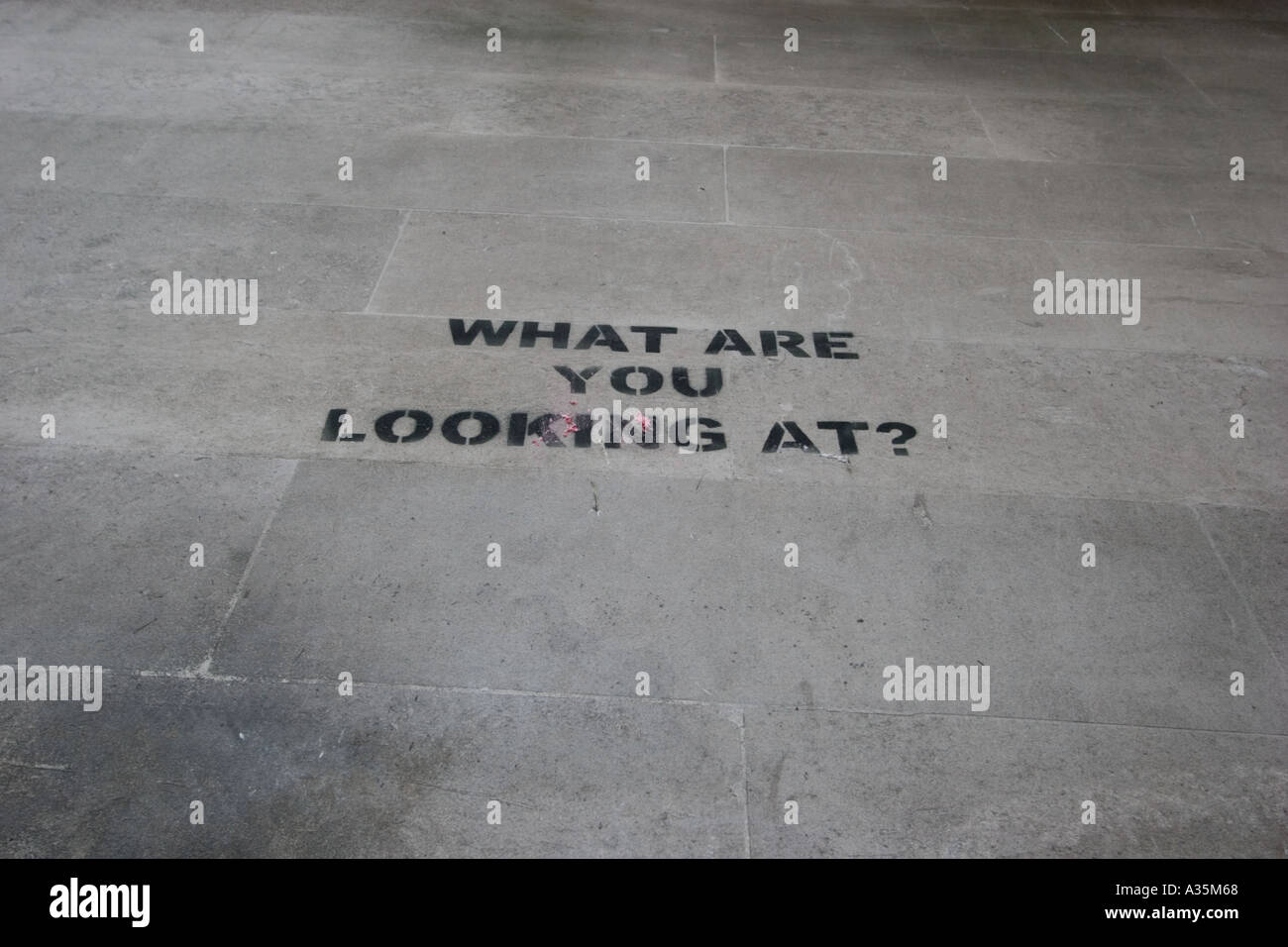 What are you looking at Graffiti graffito sprayed with stencil onto ...
