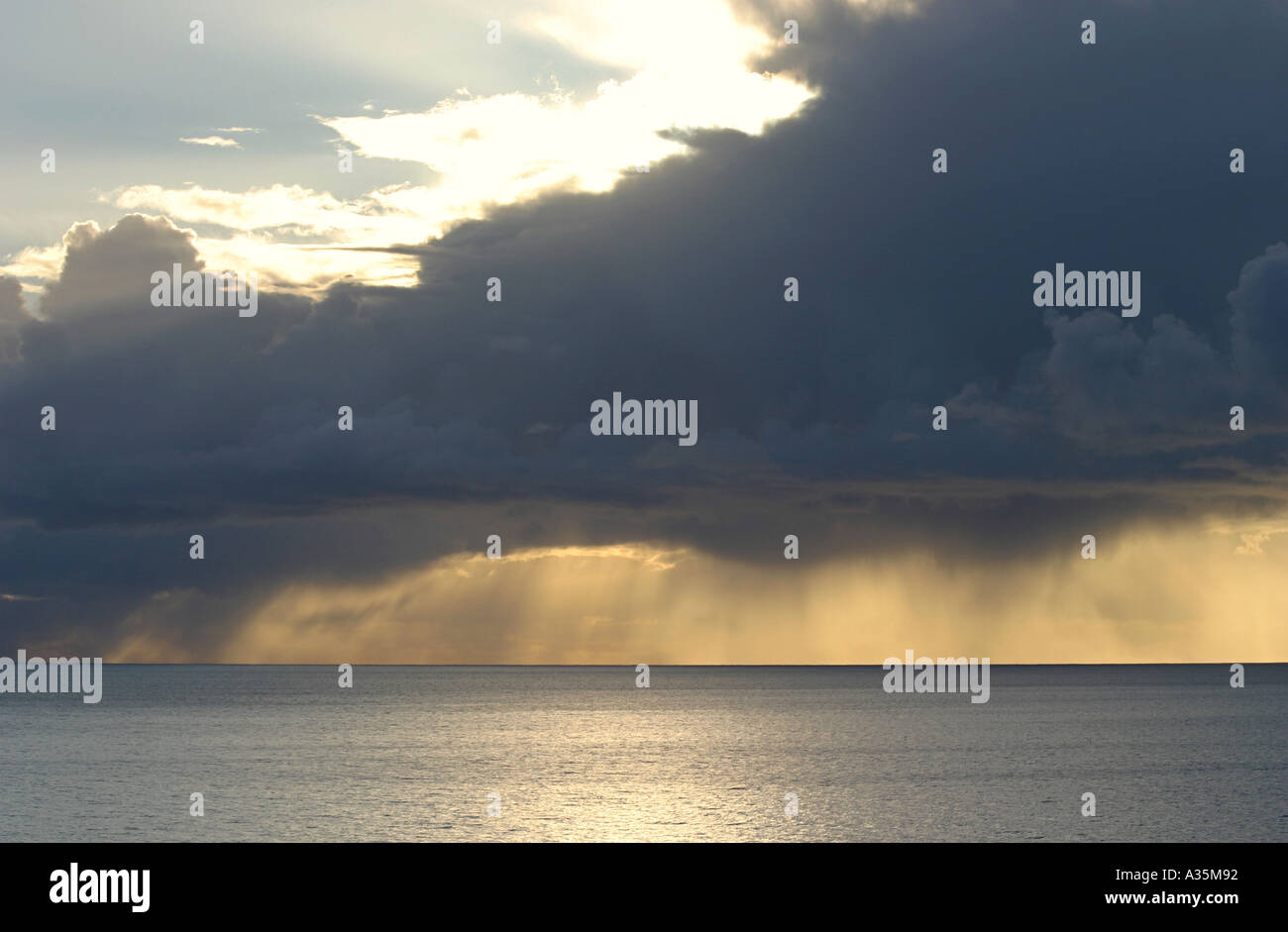 rain clouds in the sea Stock Photo - Alamy