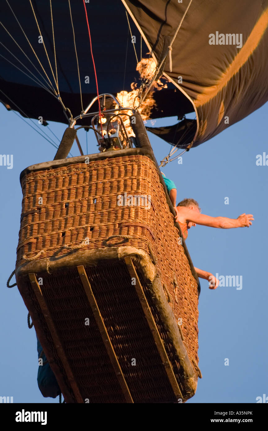 People in a hot air balloon in the sky Stock Photo - Alamy