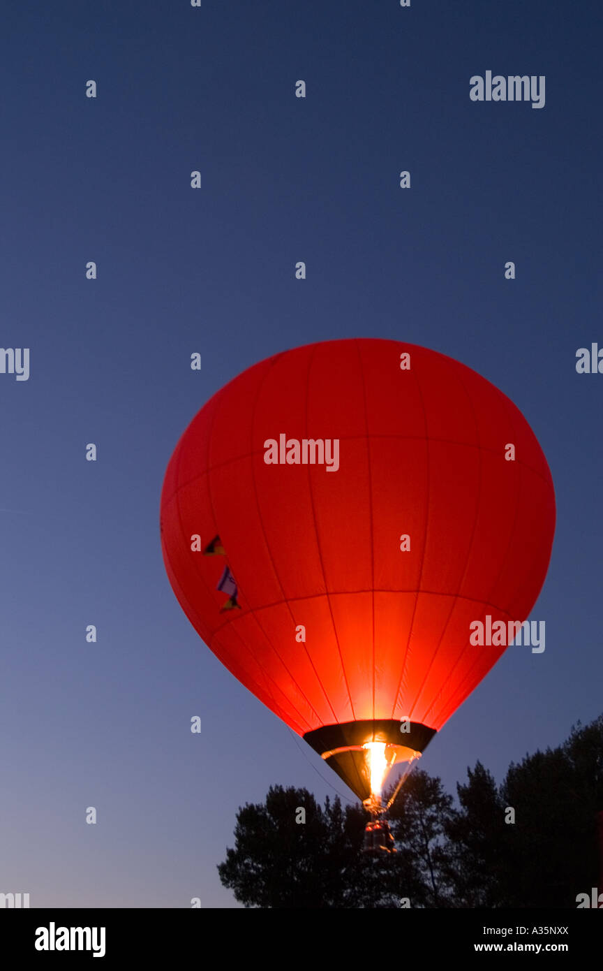 Hot air balloon by night Stock Photo - Alamy