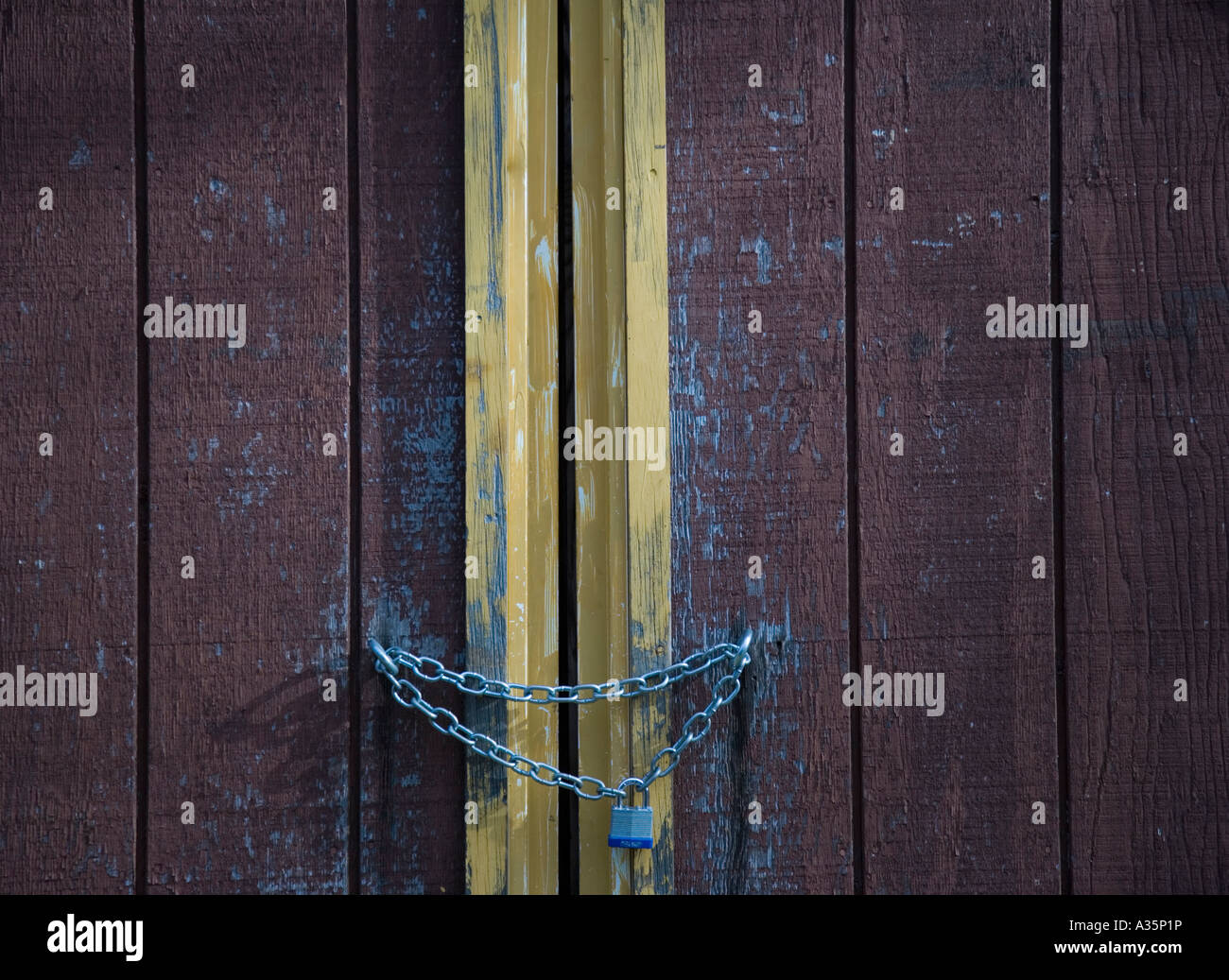 Lock chain on rustic door hi-res stock photography and images - Alamy