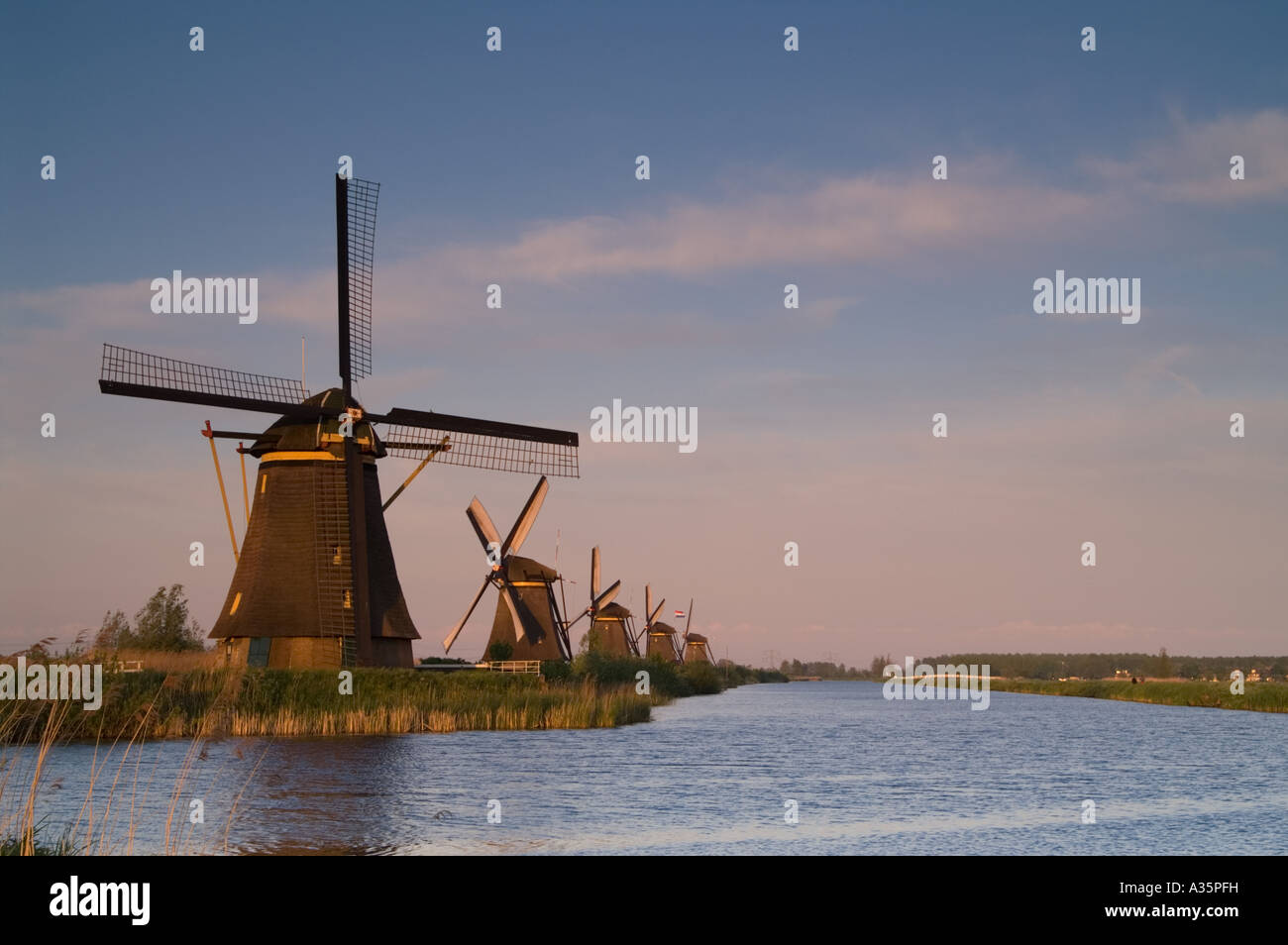Typical Dutch windmills in the village Kinderdijk Stock Photo - Alamy