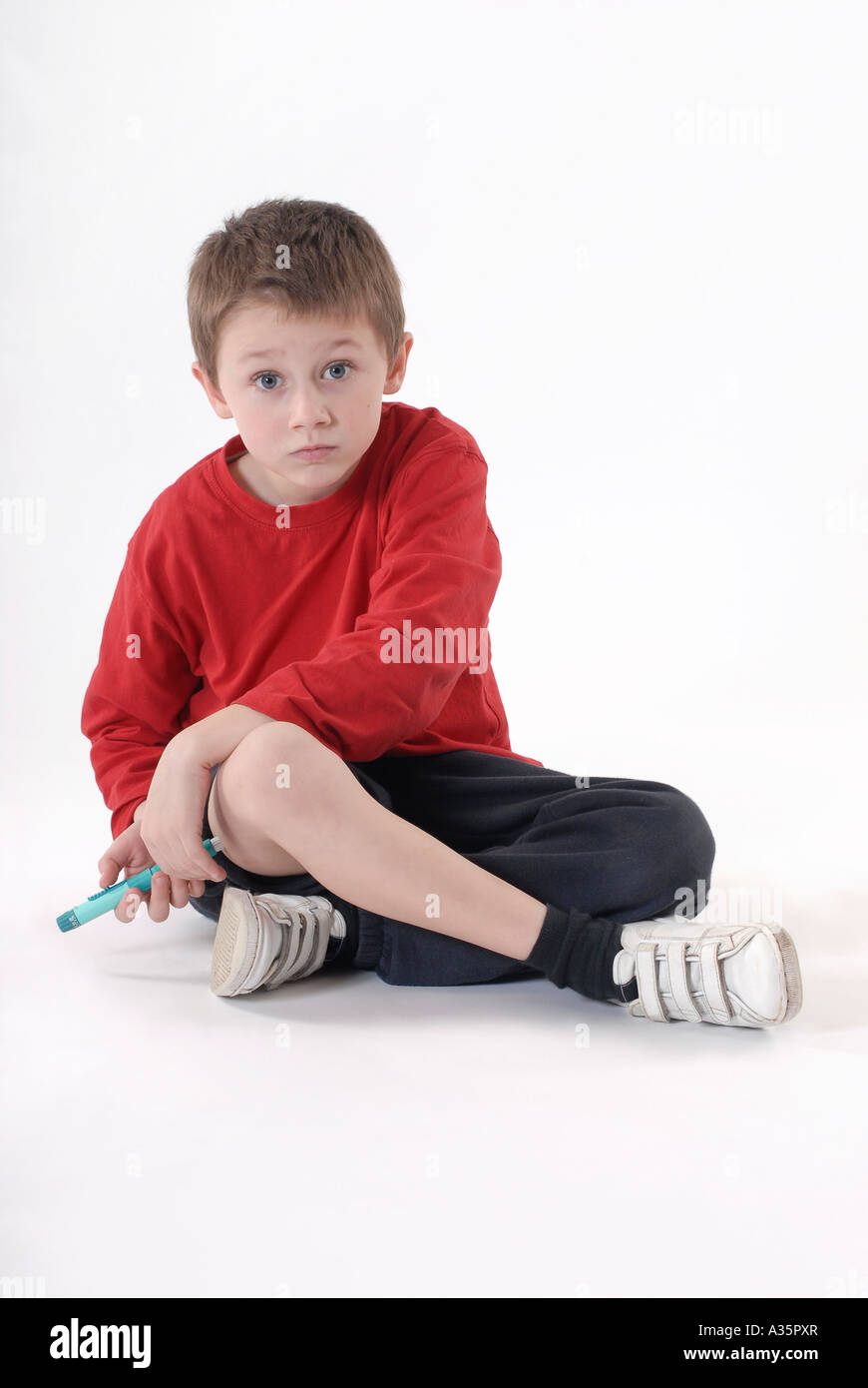 Young diabetic boy injecting himself with insulin Stock Photo - Alamy