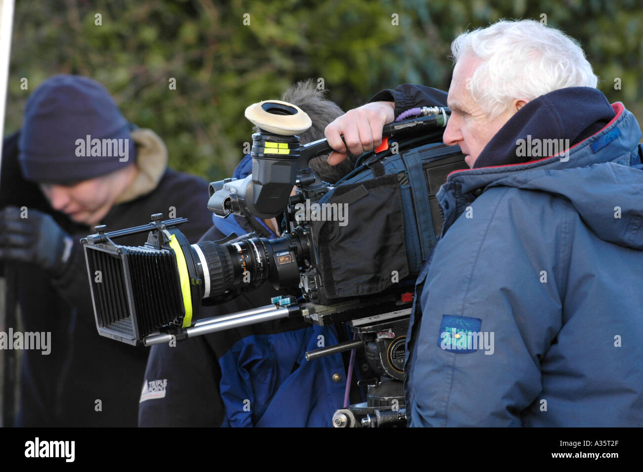 Cameraman filming scene from the BBC Wales TV series Belonging being ...