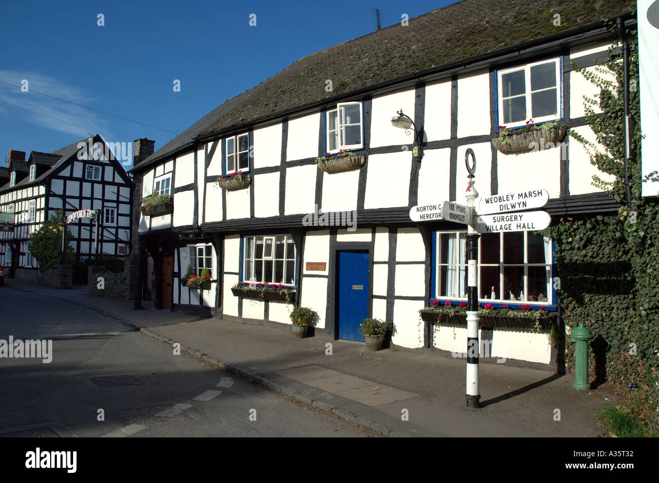 Buildings and Road Sign Weobley Village Herefordshire England Stock ...