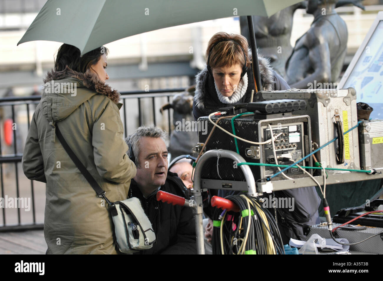 Director Ed Thomas watching playback of a scene from the S4C TV film ...