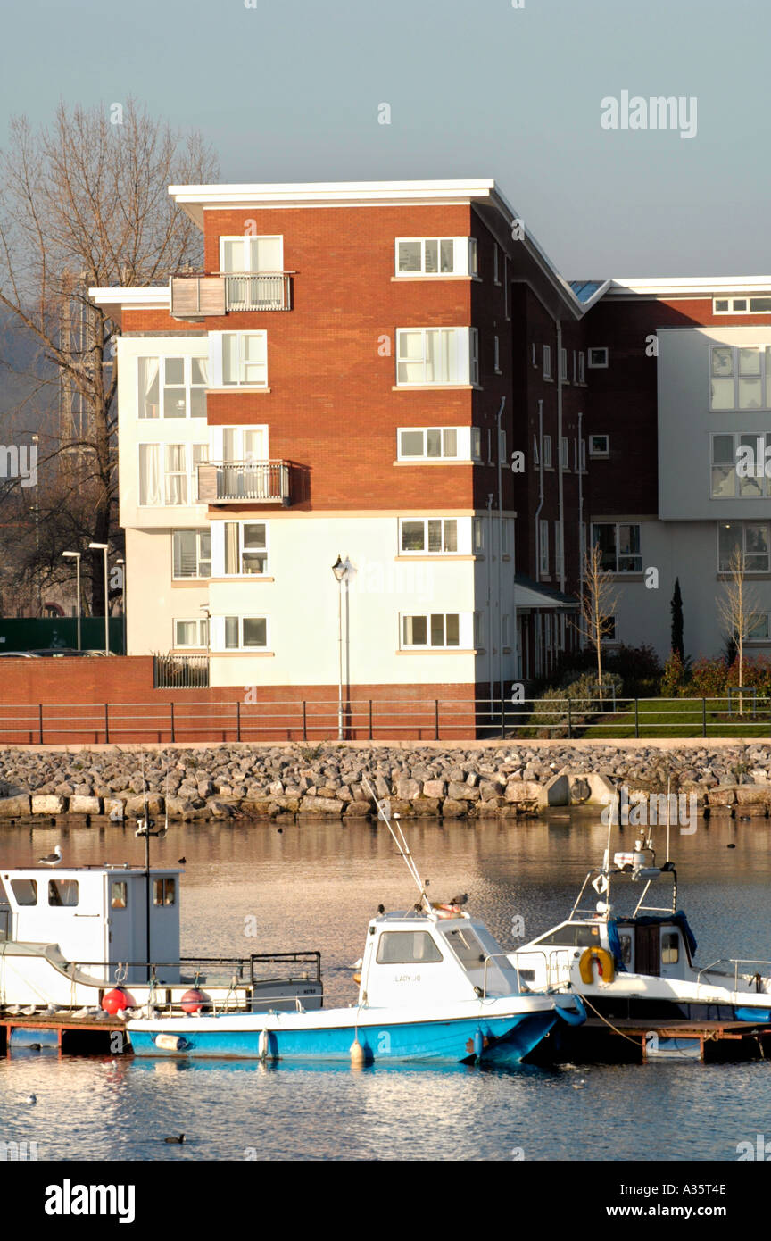 Modern apartment buildings overlooking Cardiff Bay waterfront in early ...