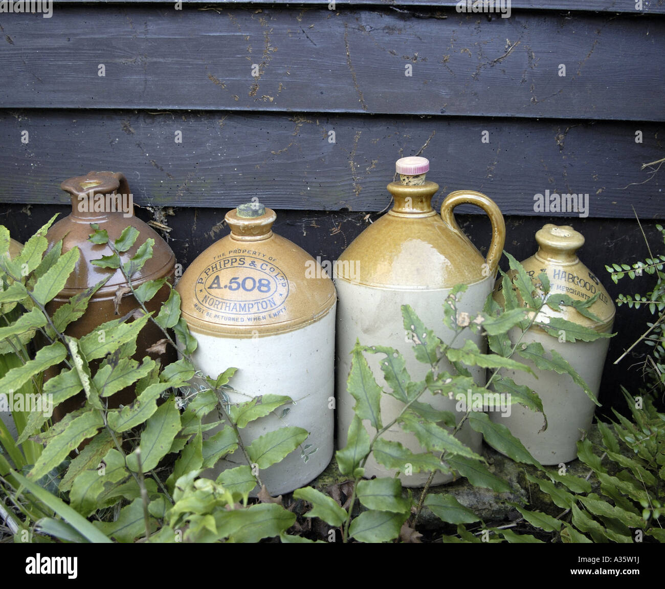 Ceramic clay beer containers in a garden Stock Photo - Alamy