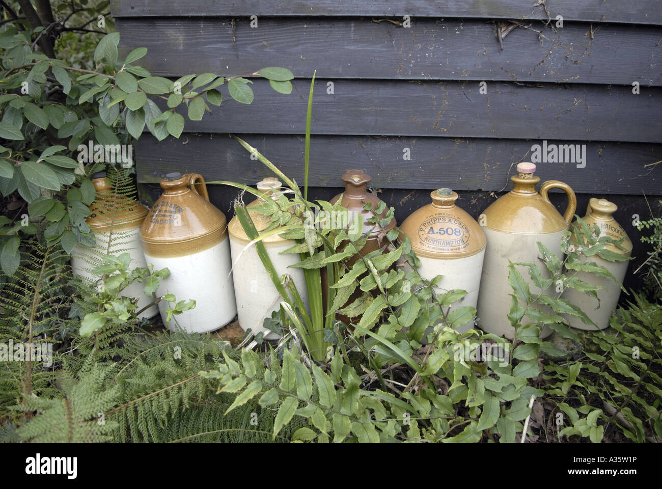 Ceramic clay beer containers in a garden Stock Photo - Alamy
