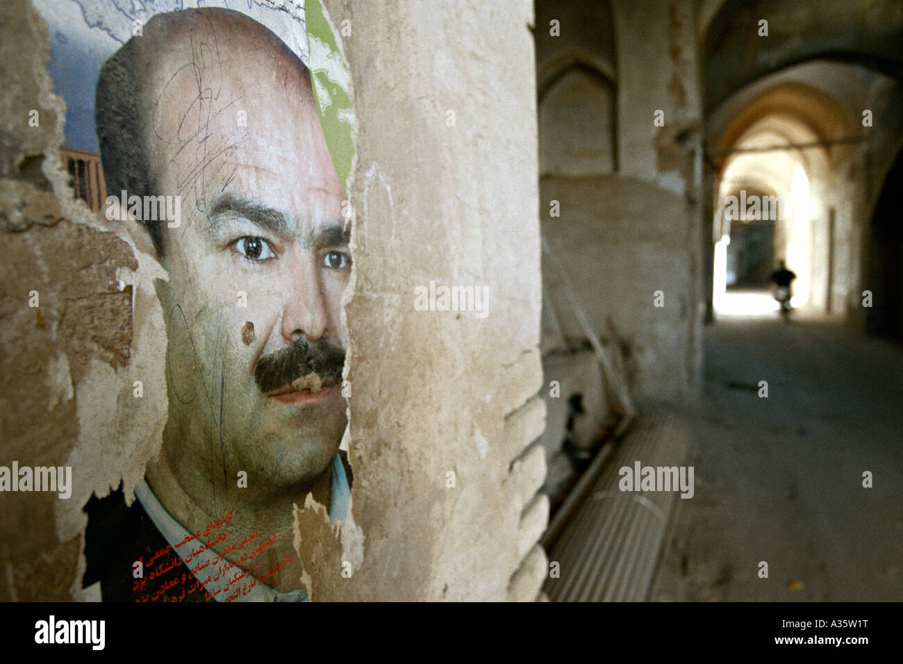 A poster on the wall inside a passageway adjacent to the Jameh Mosque ...