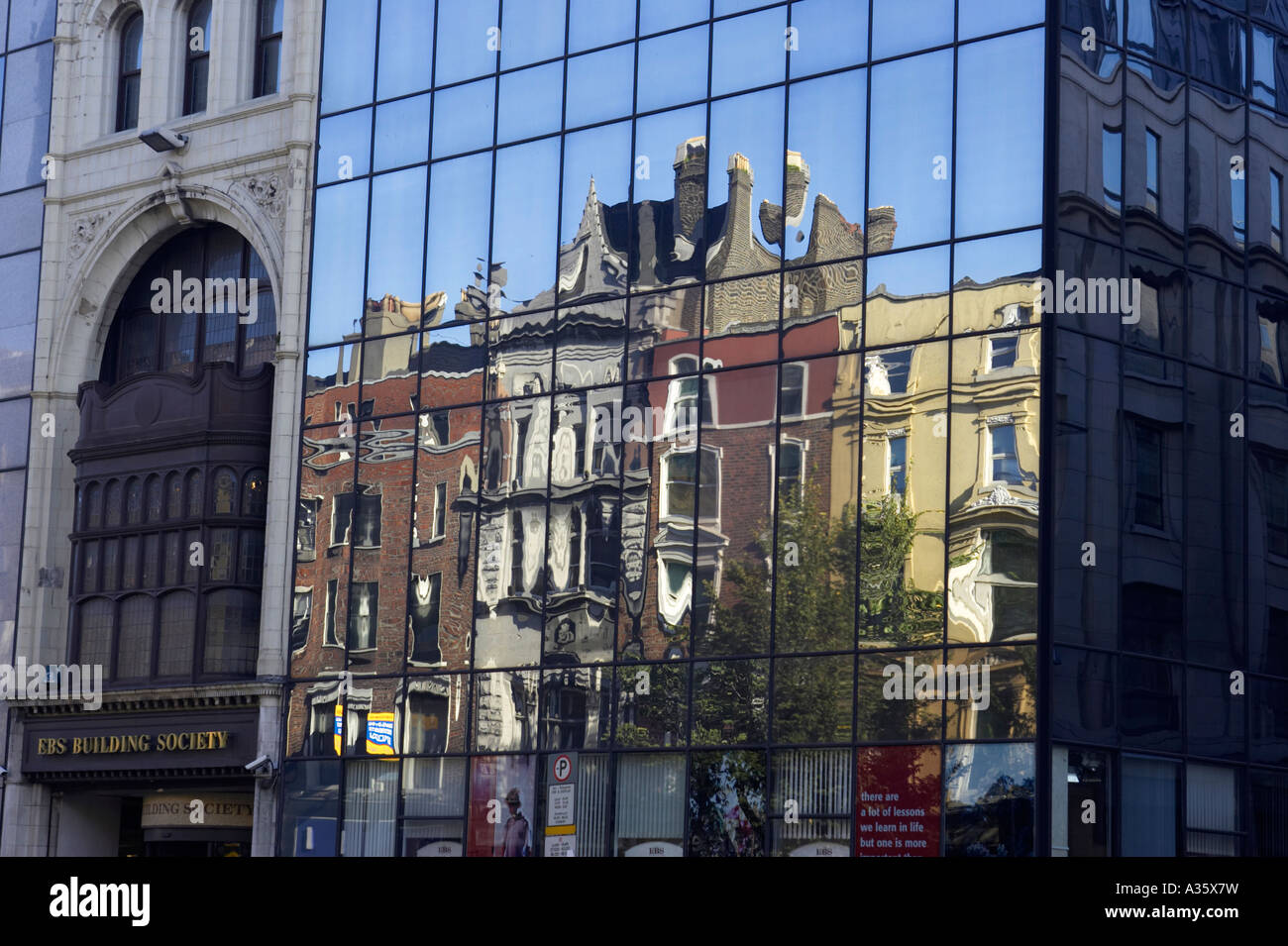 reflection of old historic buildings in plate glass new modern building ...