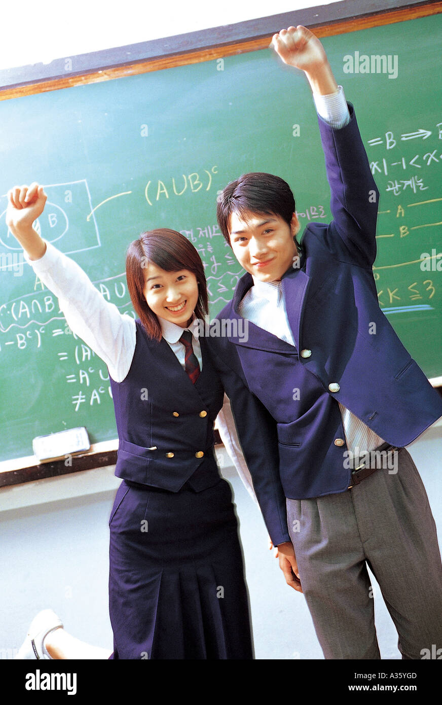 School boys fighting classroom hi-res stock photography and images - Alamy