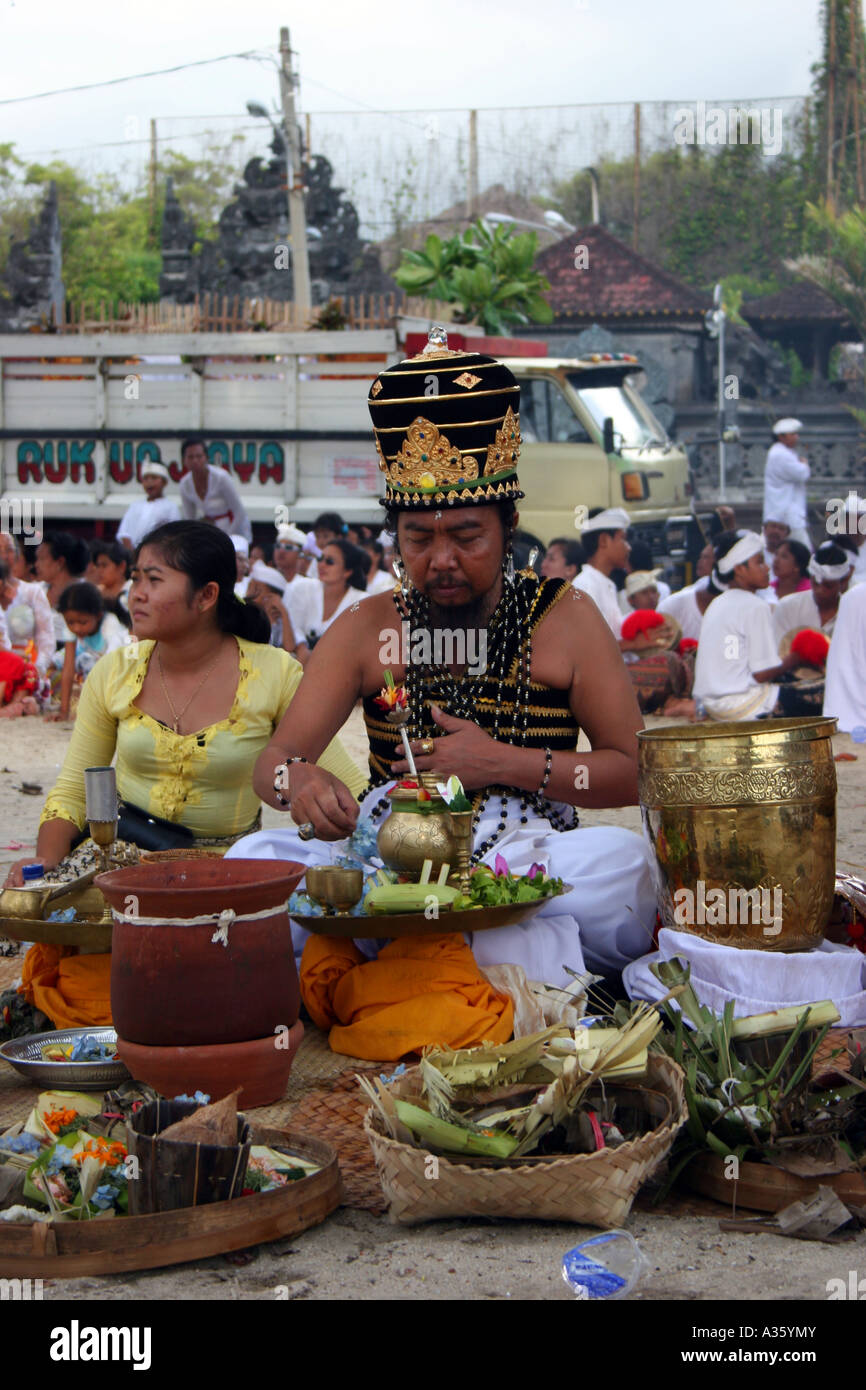 Religious Hindu ceremony on Kuta beach in Bali, Indonesia Stock Photo ...
