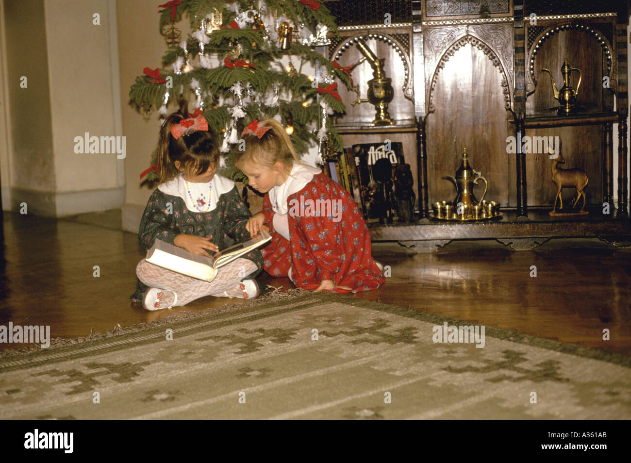 Children s story time at Christmas Stock Photo - Alamy