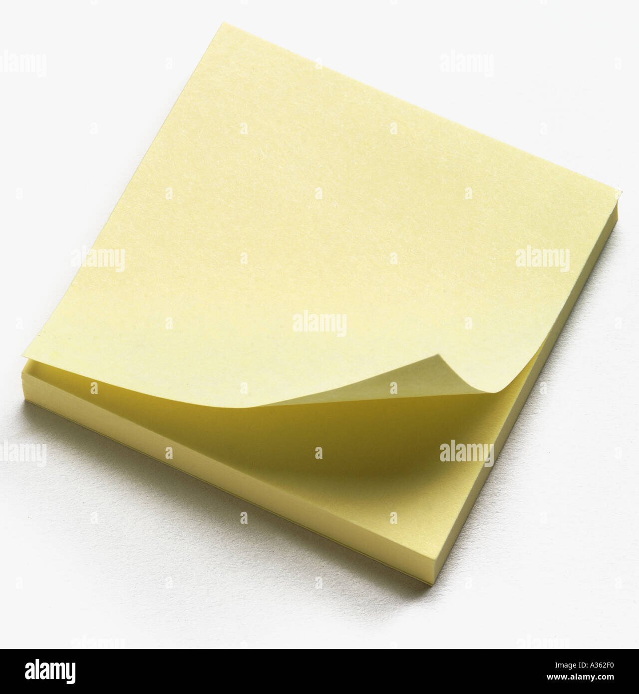 post it notepad with curled corner Stock Photo - Alamy