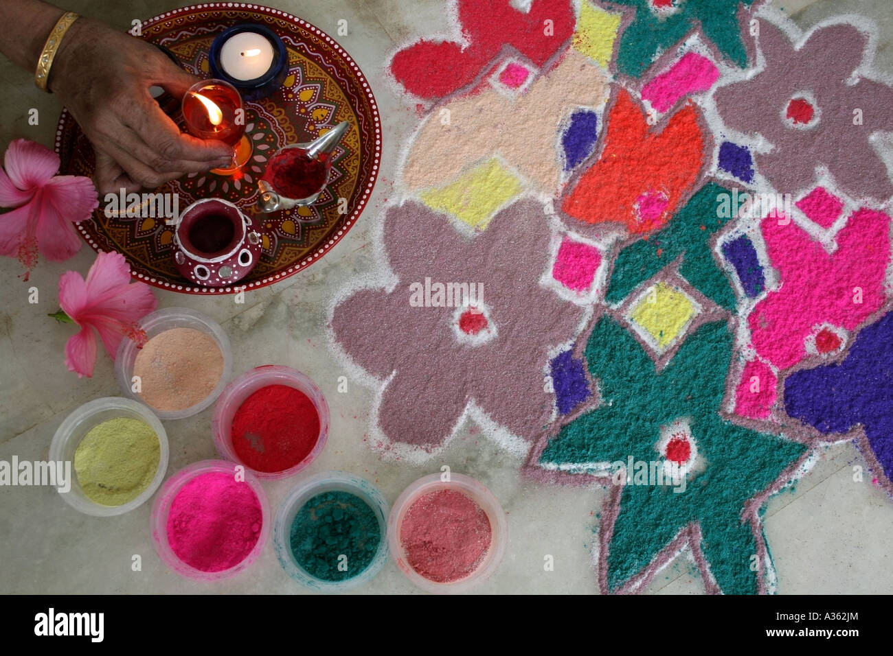 Diwali rangoli pattern and divas, India Stock Photo - Alamy
