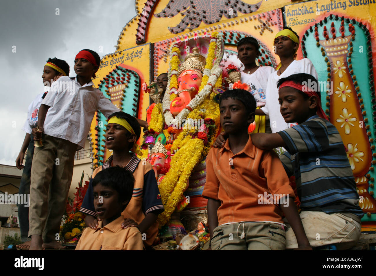 Boys on a Ganesh float at a parade for Ganesh Chaturthi , India Stock ...