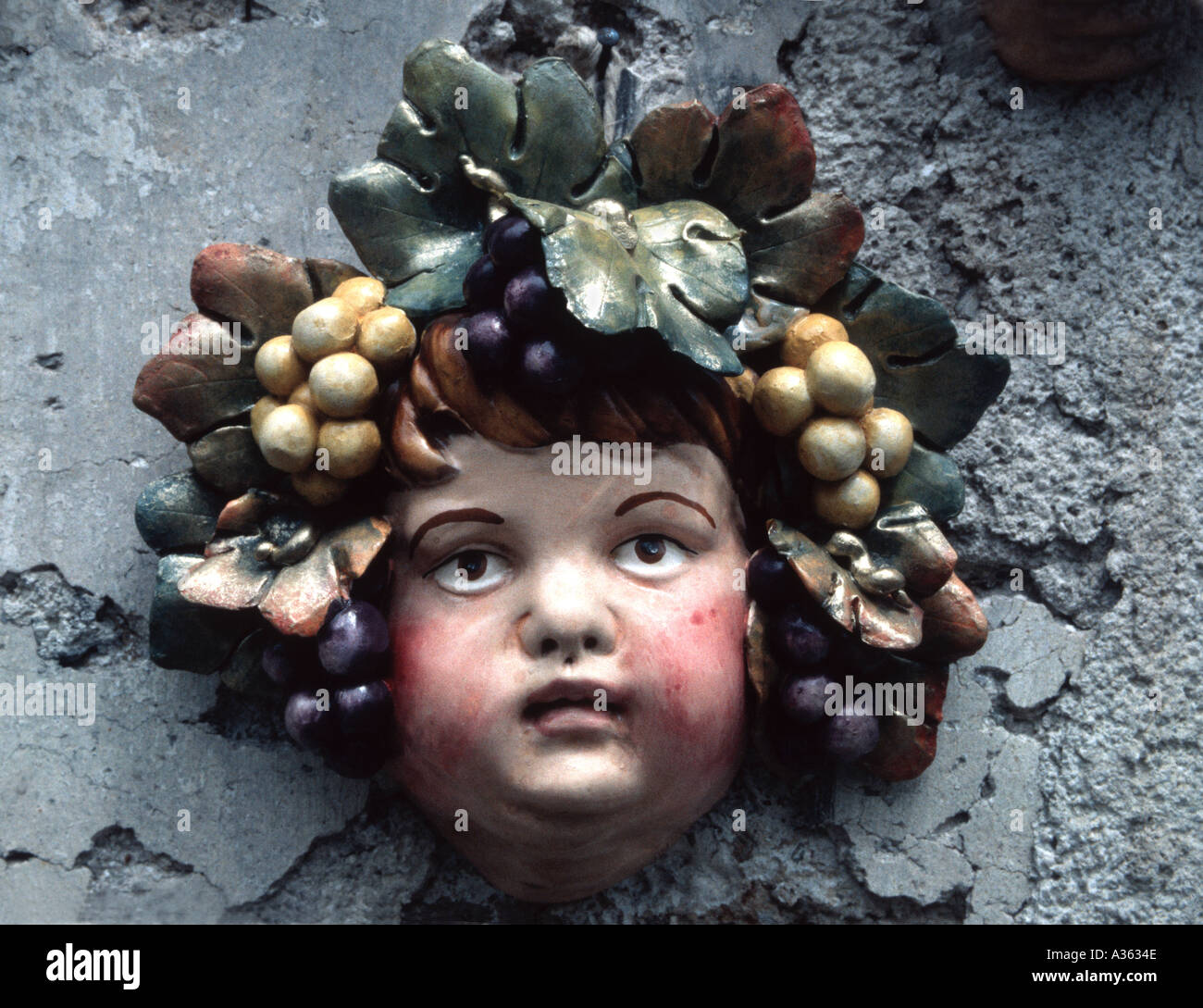 Painted Ornamental Face on Wall Monreale Sicily Stock Photo - Alamy