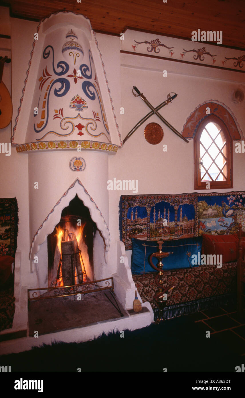Fireplace with painted shield in baronial style room Stock Photo - Alamy