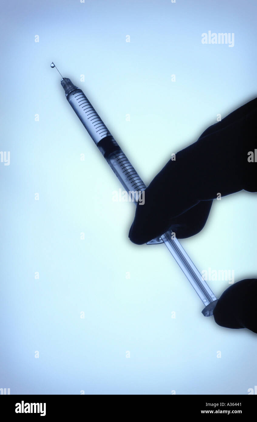 Syringe in Hand Stock Photo - Alamy