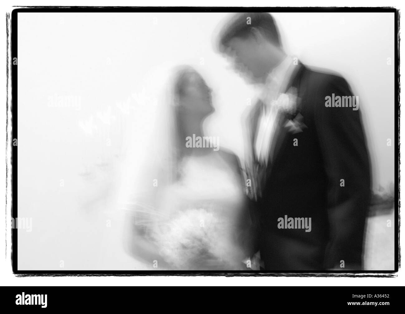 Blurry photo of bride and groom Stock Photo - Alamy