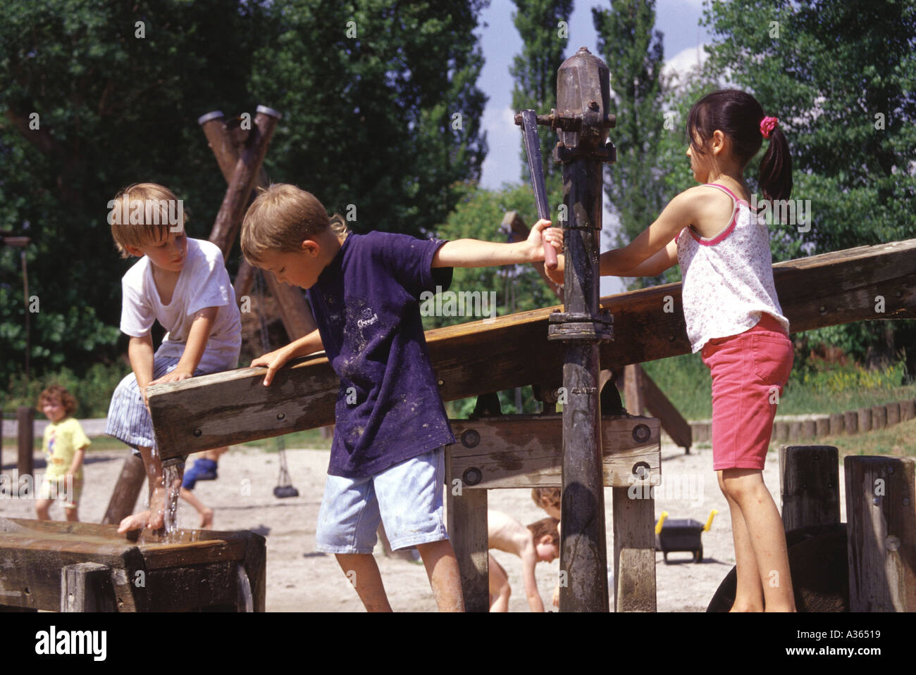 Children playing with water Stock Photo - Alamy