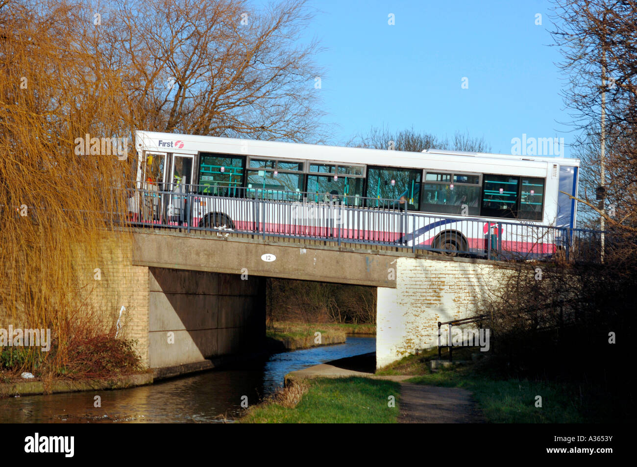 Bus Going Over A Bridge Crossing The Cauldon Canal In Staffordshire (UK ...
