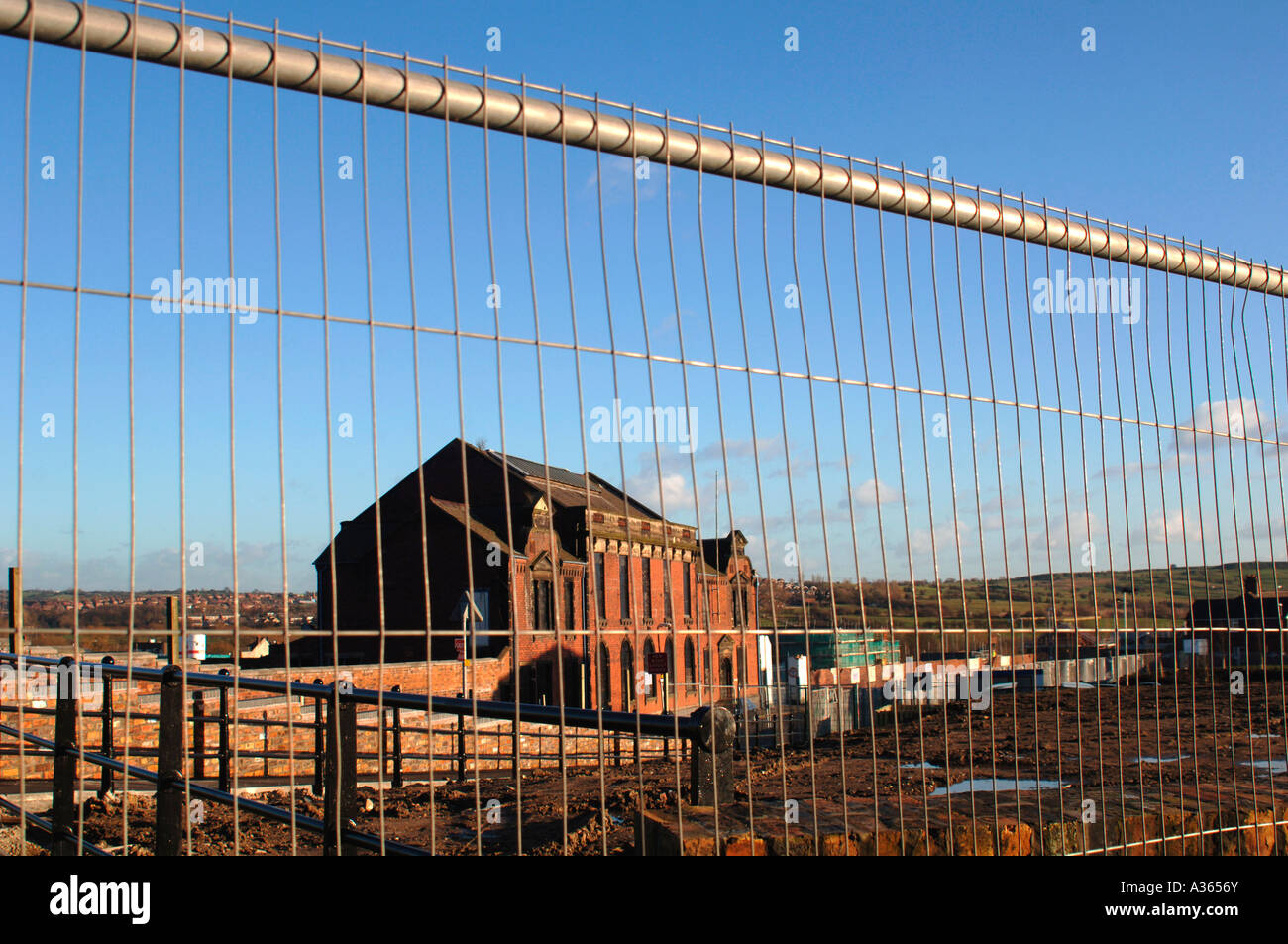 A Disused Building Seen Through Metal Fencing,The Structure Is Listed ...
