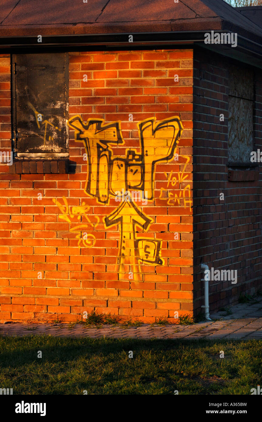 Graffiti Sprayed Onto A Buildings Wall Stock Photo - Alamy