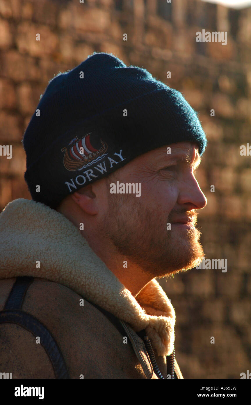 Profile Of A Man Dressed For Winter Stock Photo - Alamy