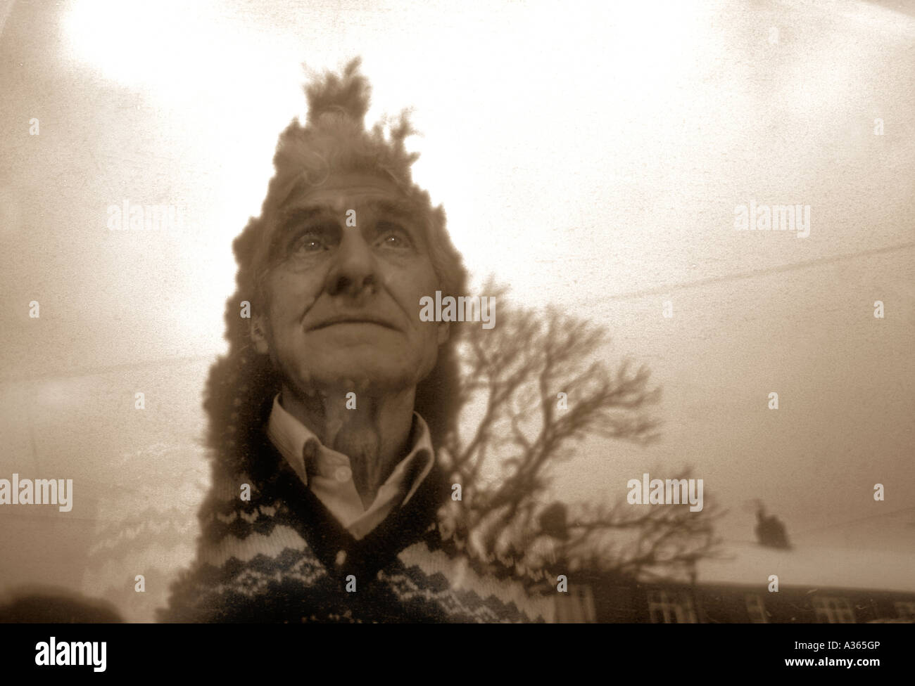 Portrait Of An Old Man Looking Through A Window At A Snow Storm, With ...
