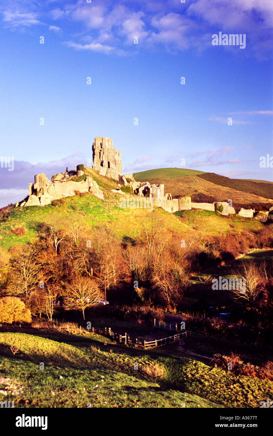 Winter view of Corfe Castle Dorset in late afternoon sunlight as seen ...