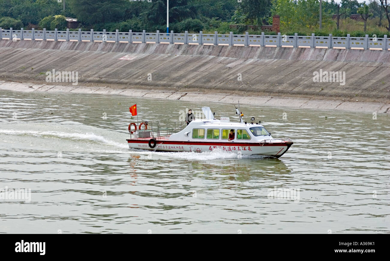 CHINA YANGTZE RIVER SANDOUPING Chinese officials in police boat flying ...