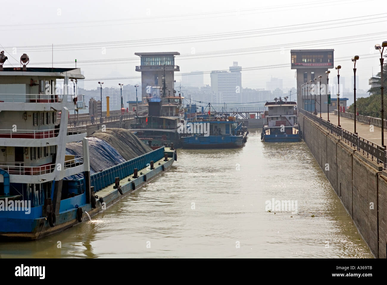 CHINA YICHANG Barges and ferries wait in the locks at the Gezhouba Dam ...