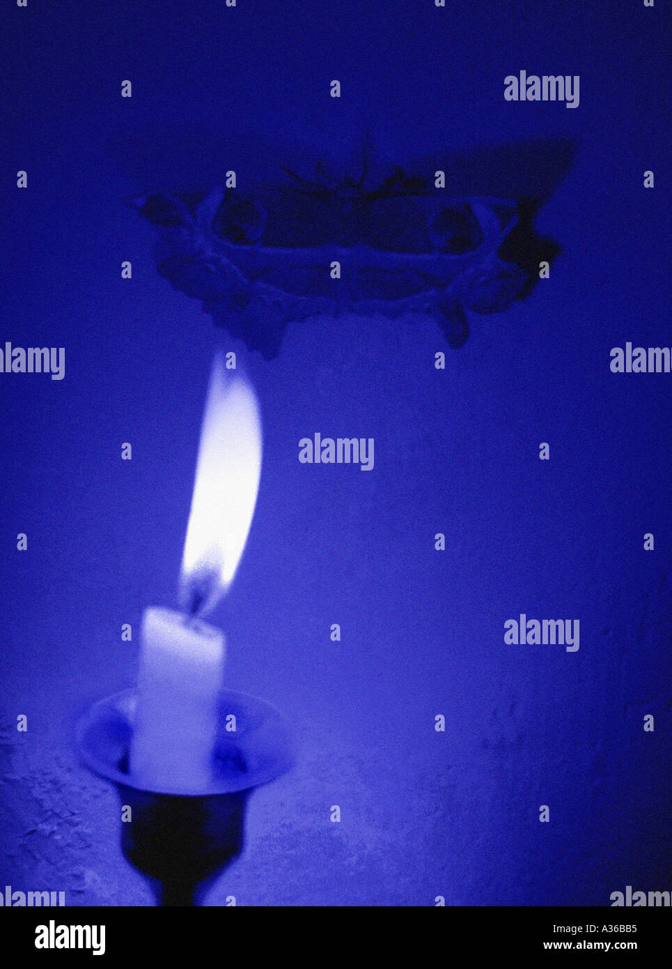 candle and the moth Stock Photo - Alamy