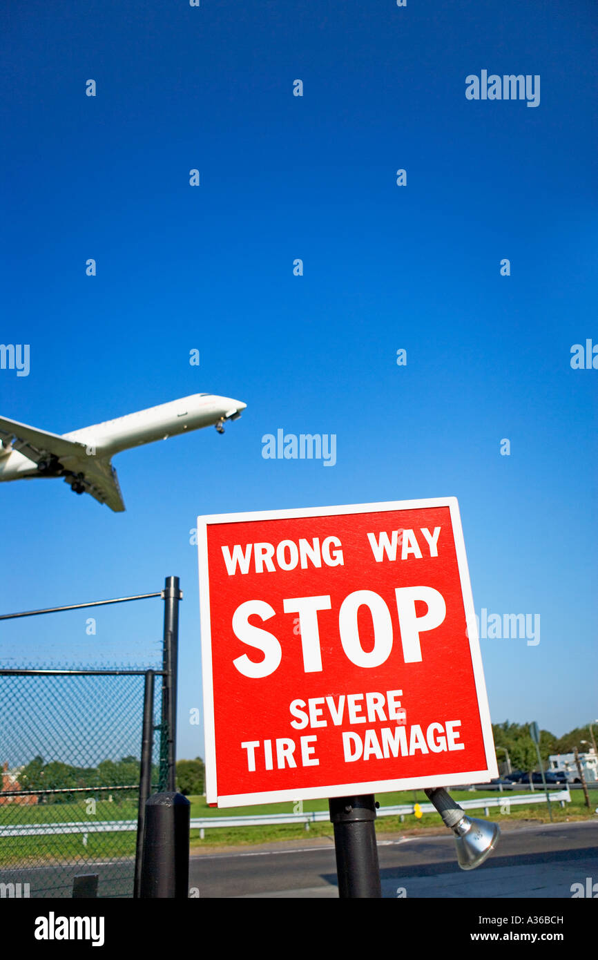 AIRPLANE, STOP SIGN Stock Photo - Alamy