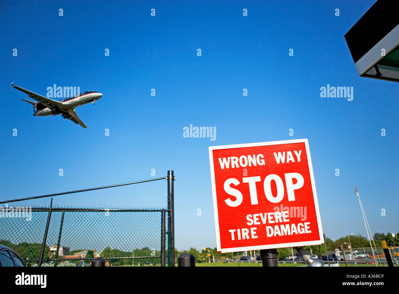 AIRPLANE, STOP SIGN Stock Photo - Alamy