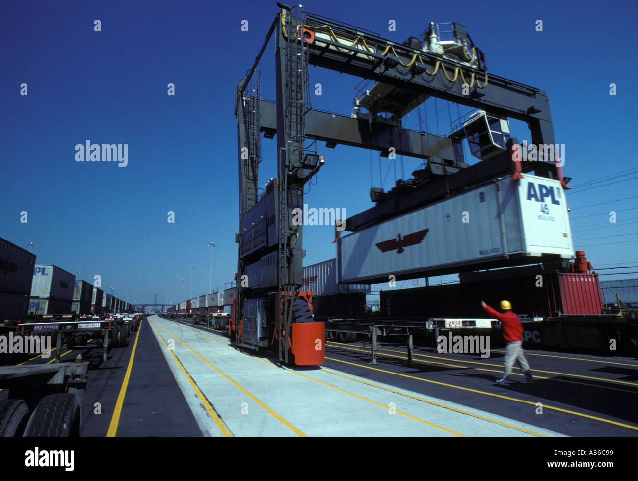 shipping container being unloaded from rail car Stock Photo - Alamy