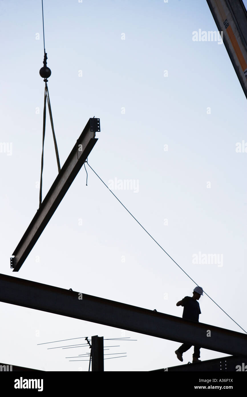 CONSTRUCTION WORKER ON BEAMS Stock Photo - Alamy