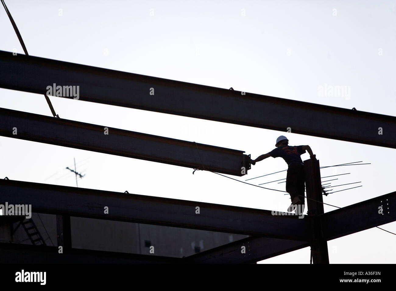 CONSTRUCTION WORKER ON BEAMS Stock Photo - Alamy
